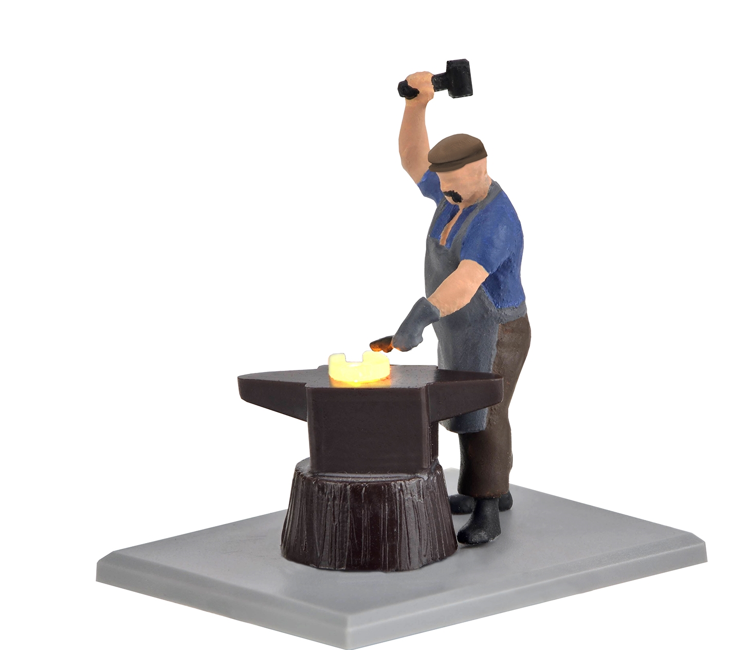 H0 Blacksmith with glowing iron, moving - E-trains