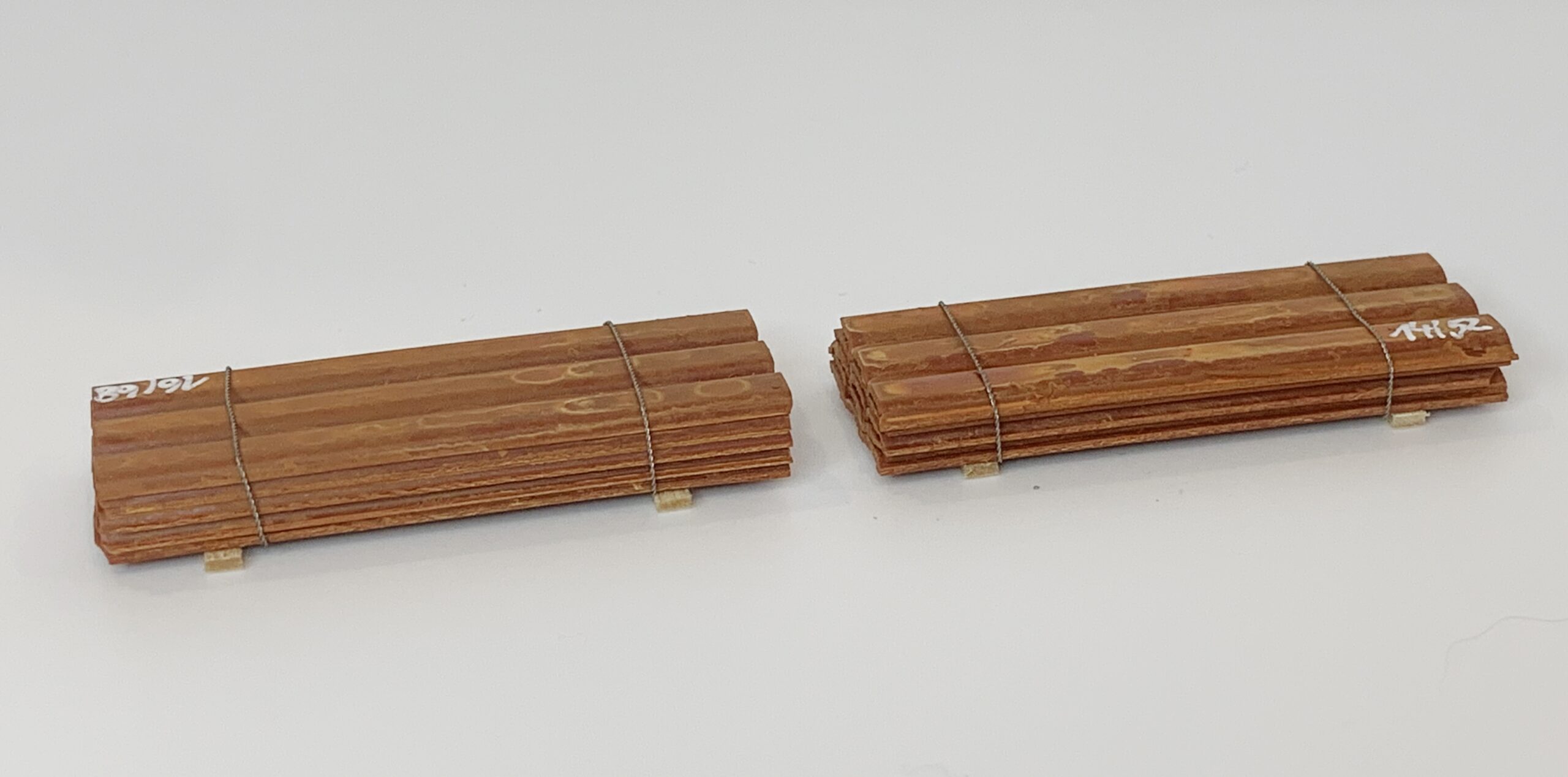 Two Stacks of Sheet Piling - E-trains